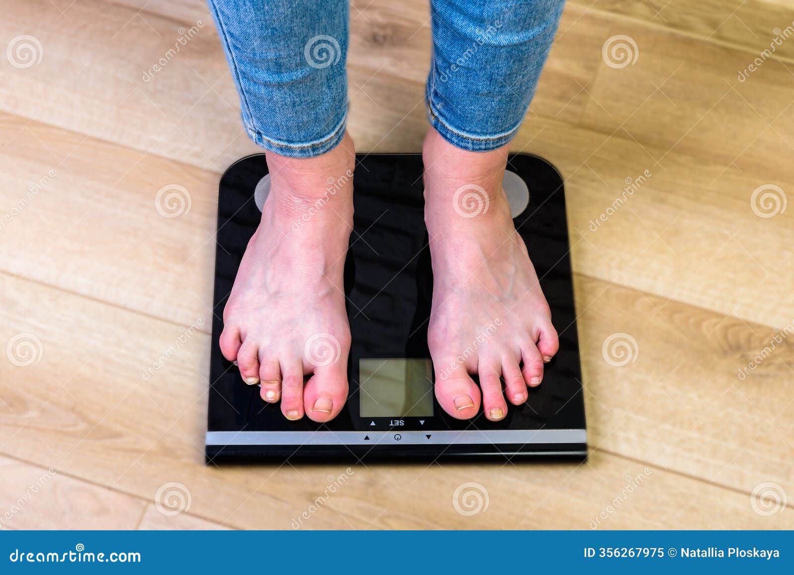 Feet Standing on Electronic Scales for Weight Control. Stock Image ...