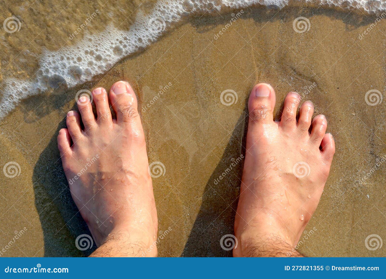 Feet step on the beach stock image. Image of female - 272821355