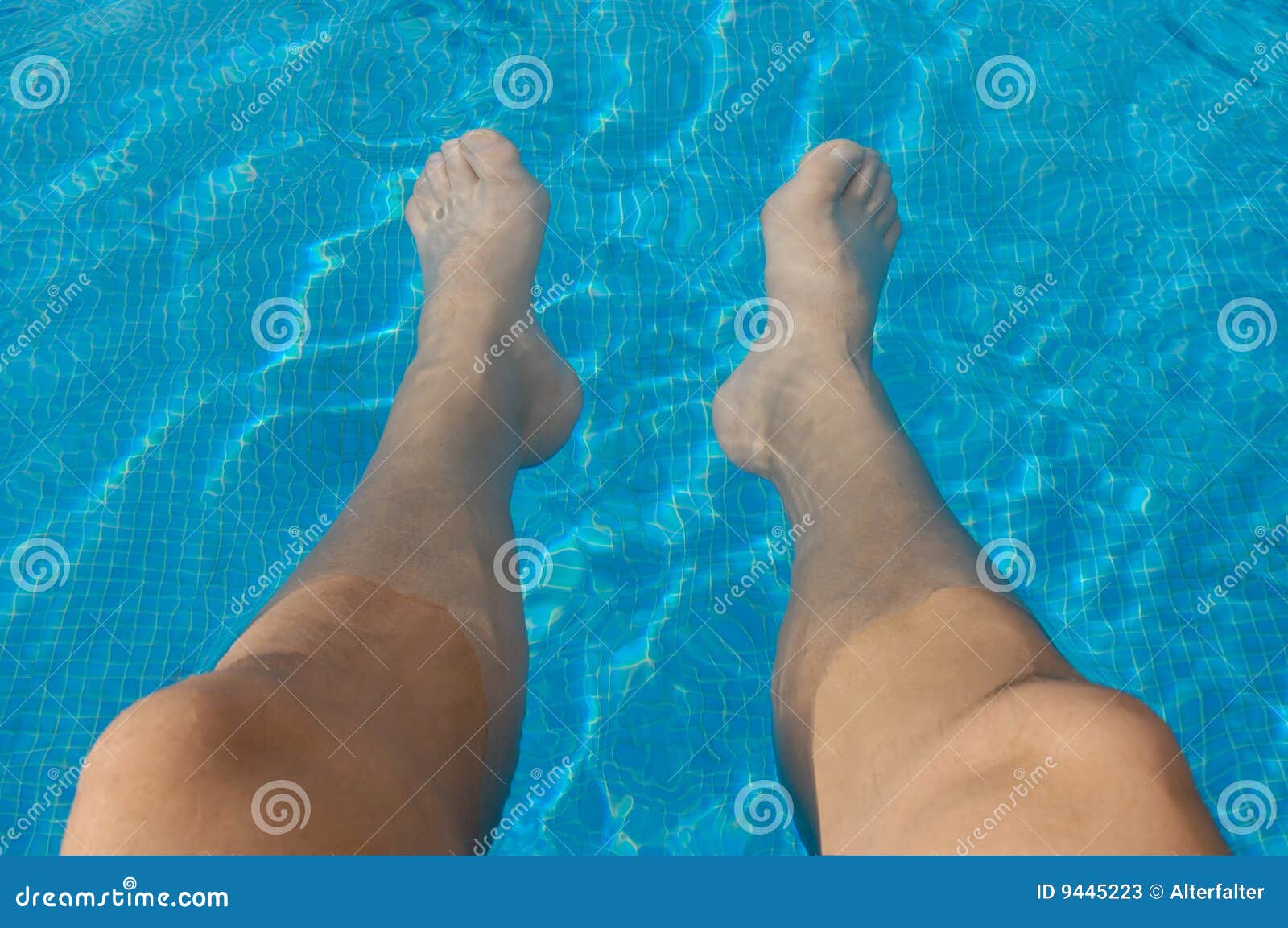 Feet in a swimming pool stock image. Image of foot, hotel - 9445223