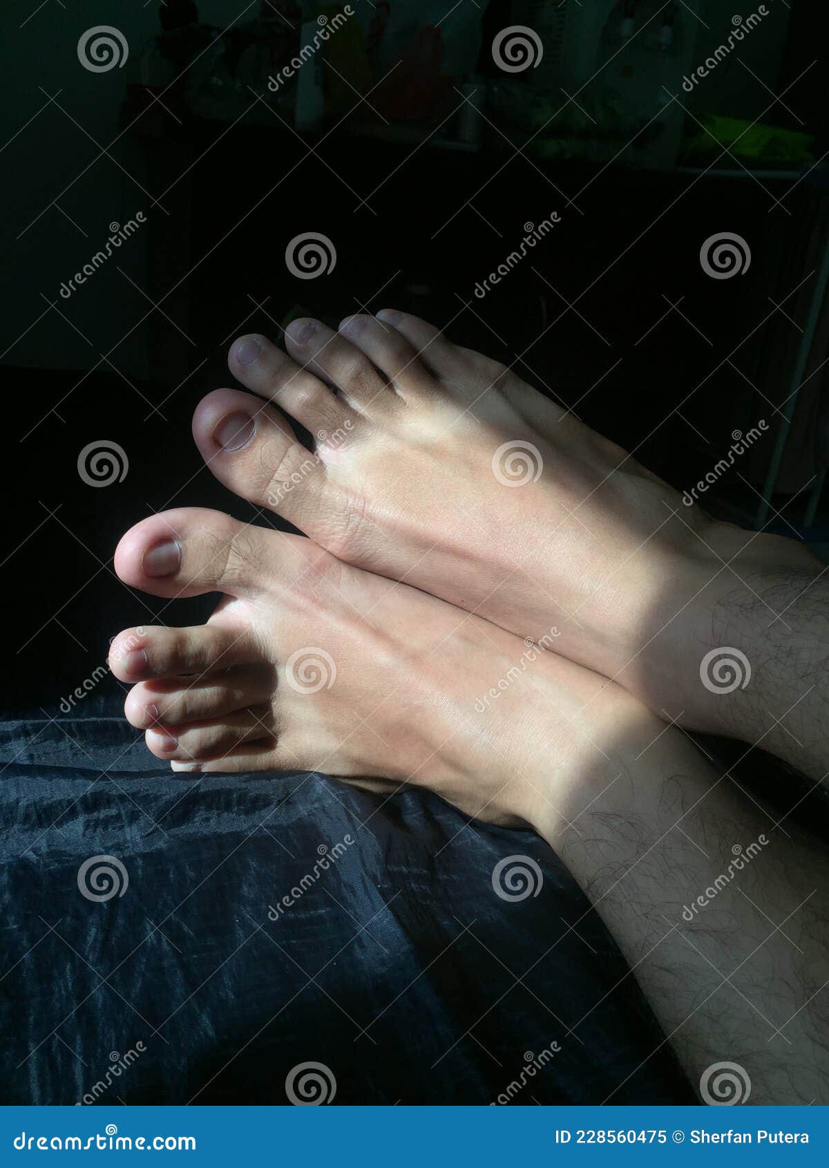 Feet under sunlight stock image. Image of feet, sunlight - 228560475