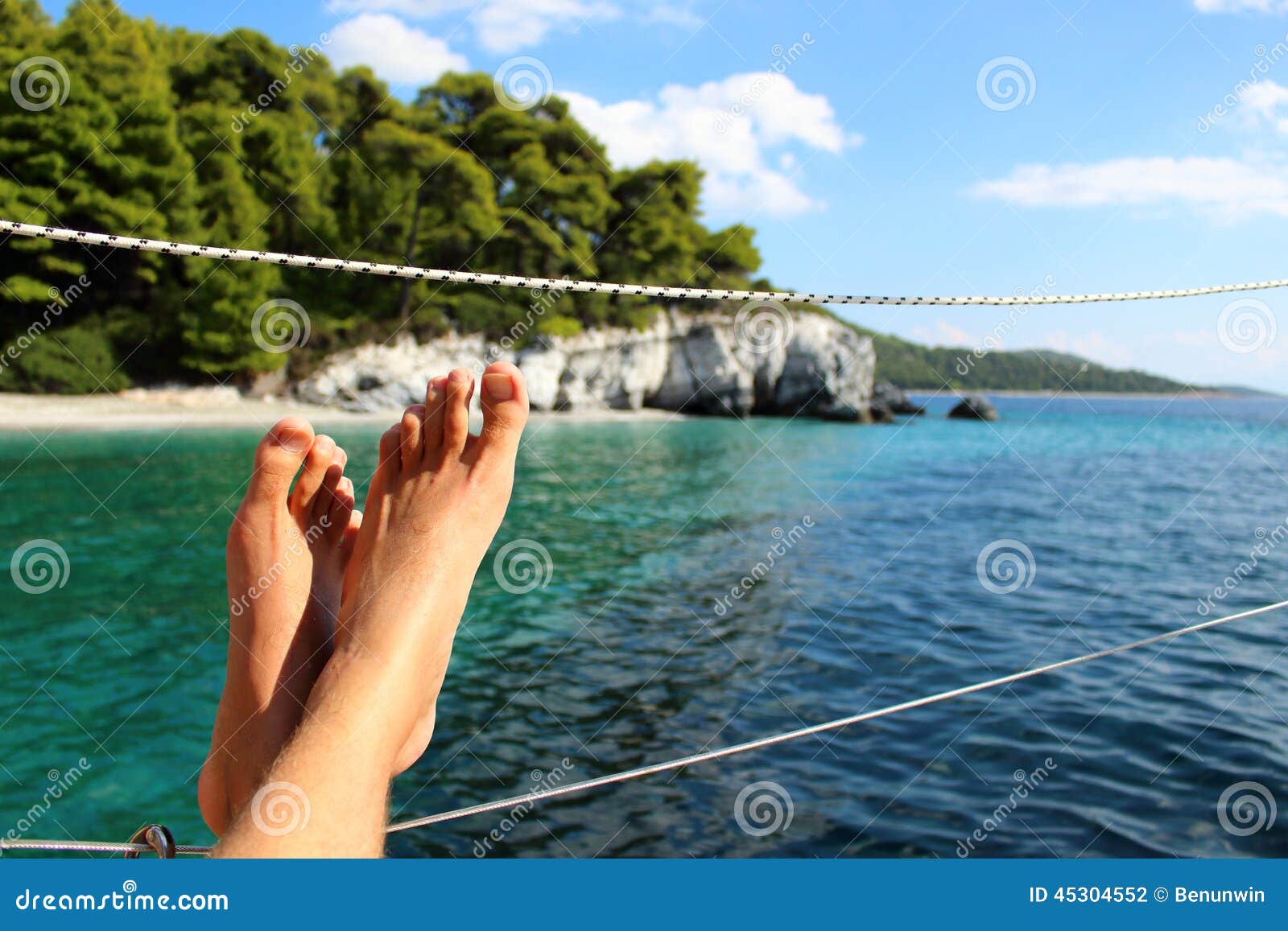 Feet up on a boat stock photo. Image of relaxed, sailing - 45304552
