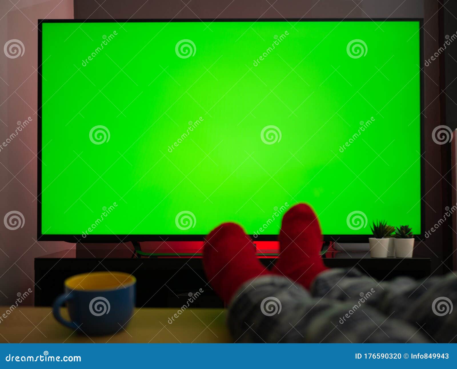 Feet Up on the Table in Front of Green Screen Tv Televison Chroma Key ...