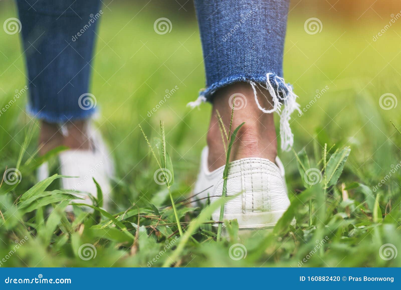 A Feet Walking on a Green Grass Stock Photo - Image of hiking, people ...
