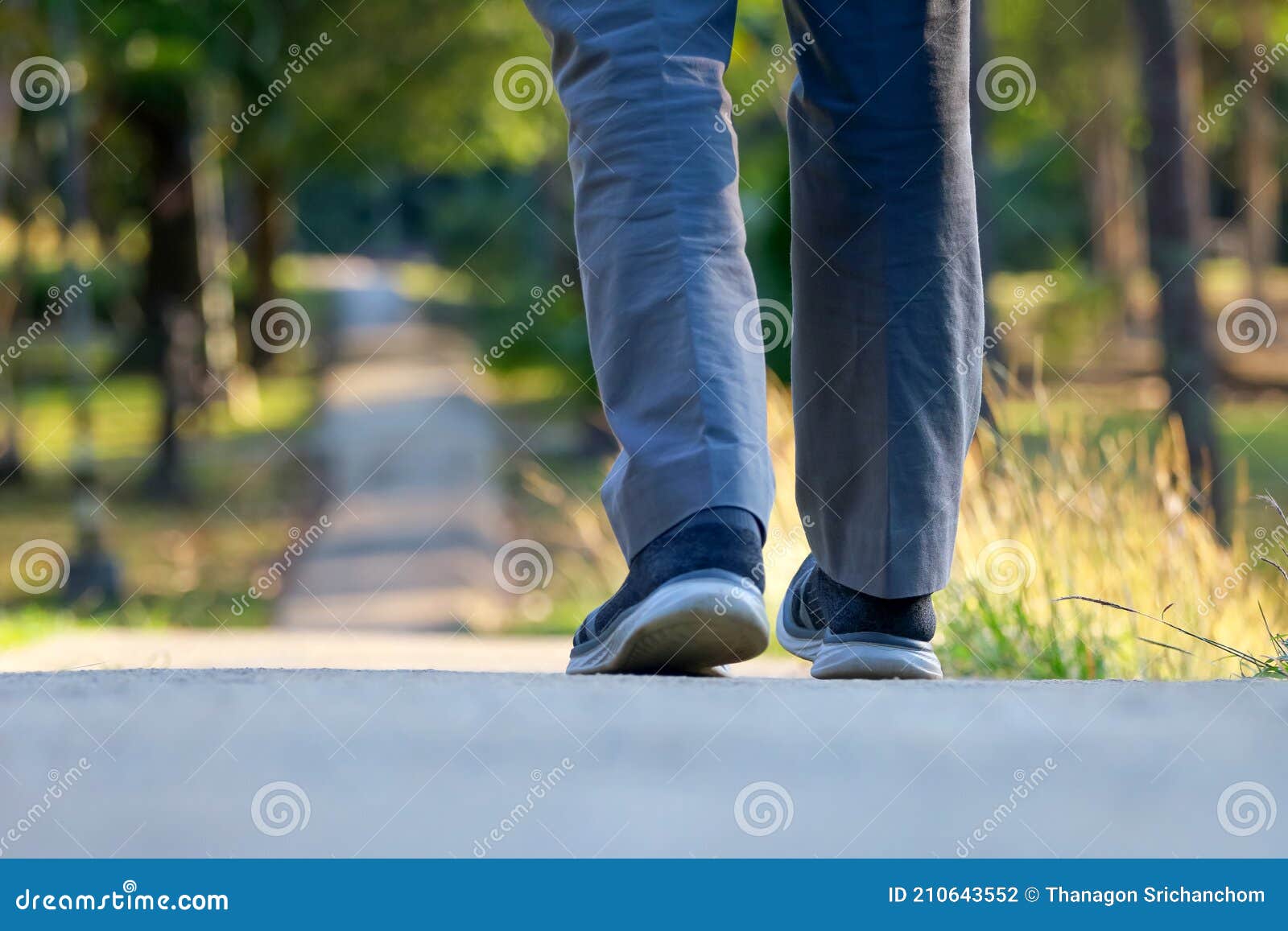 Feet Walking on the Walkway in the Park Stock Photo - Image of closeup ...