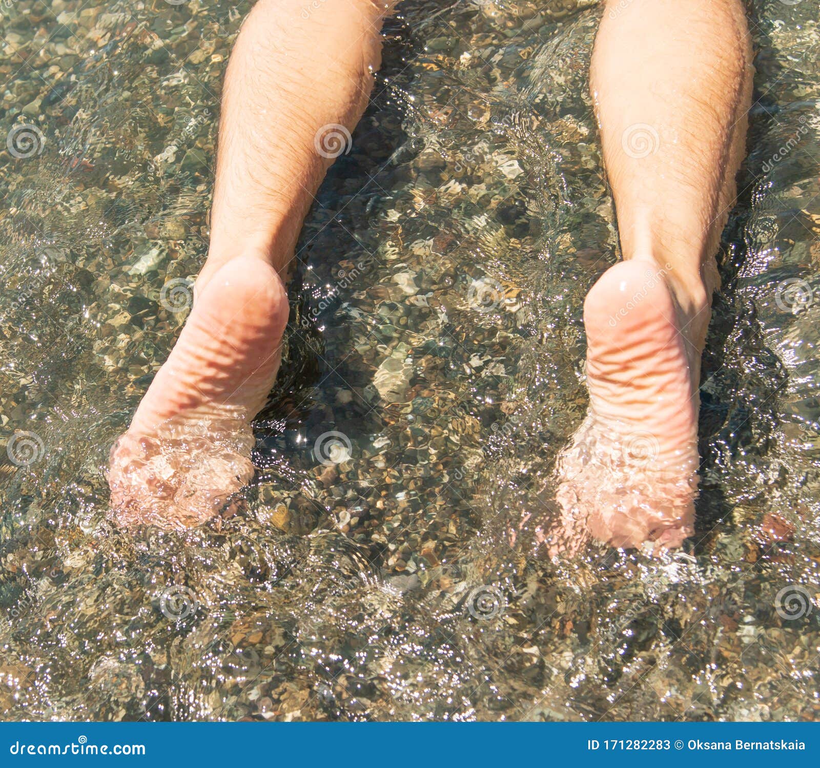 Male feet in the water stock image. Image of clean, male - 171282283
