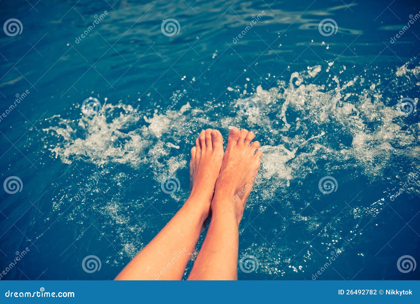 Feet in the water stock photo. Image of ocean, swim, blue - 26492782