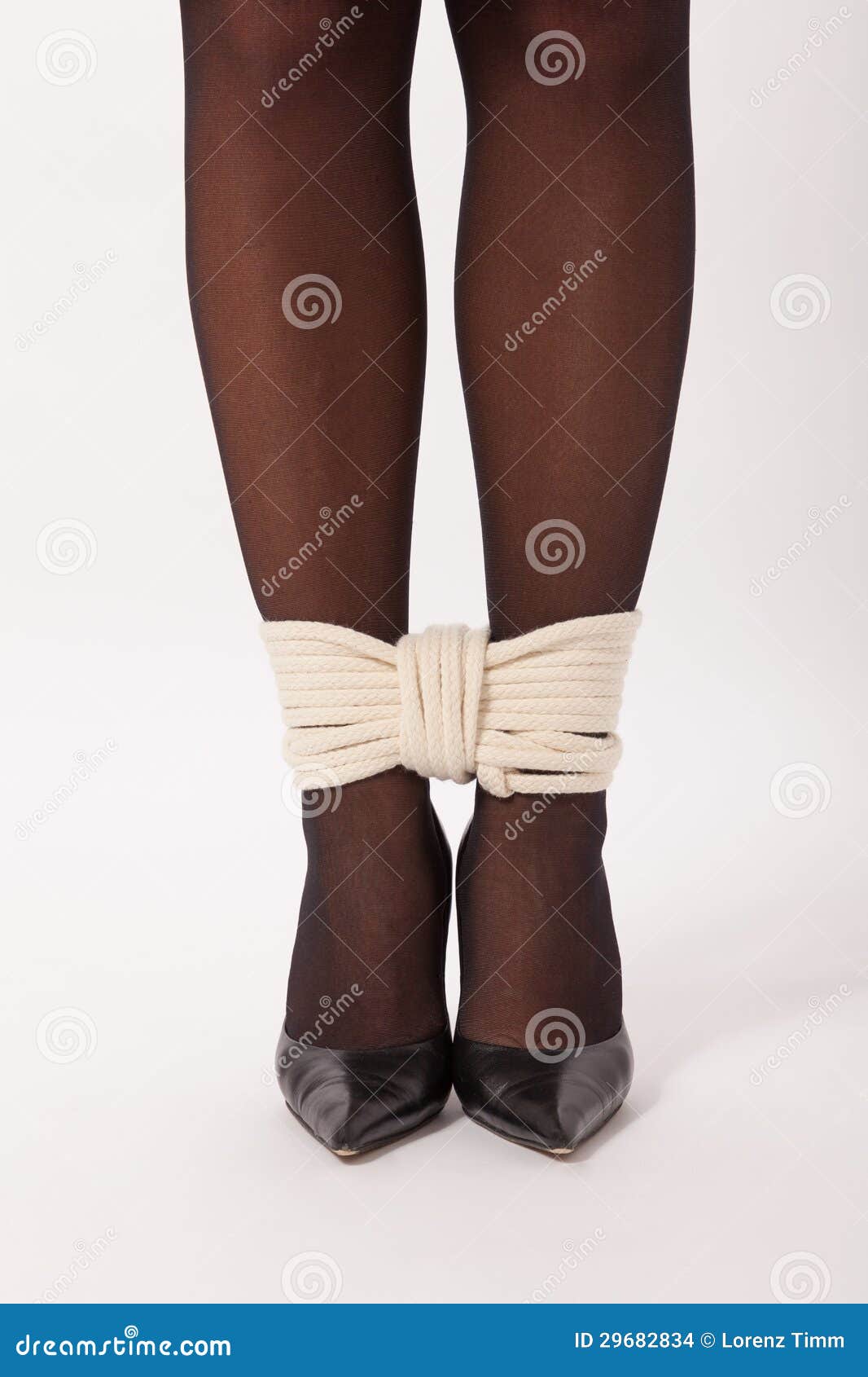 The Feet of a Woman are Tied with a Rope Stock Photo - Image of legs ...