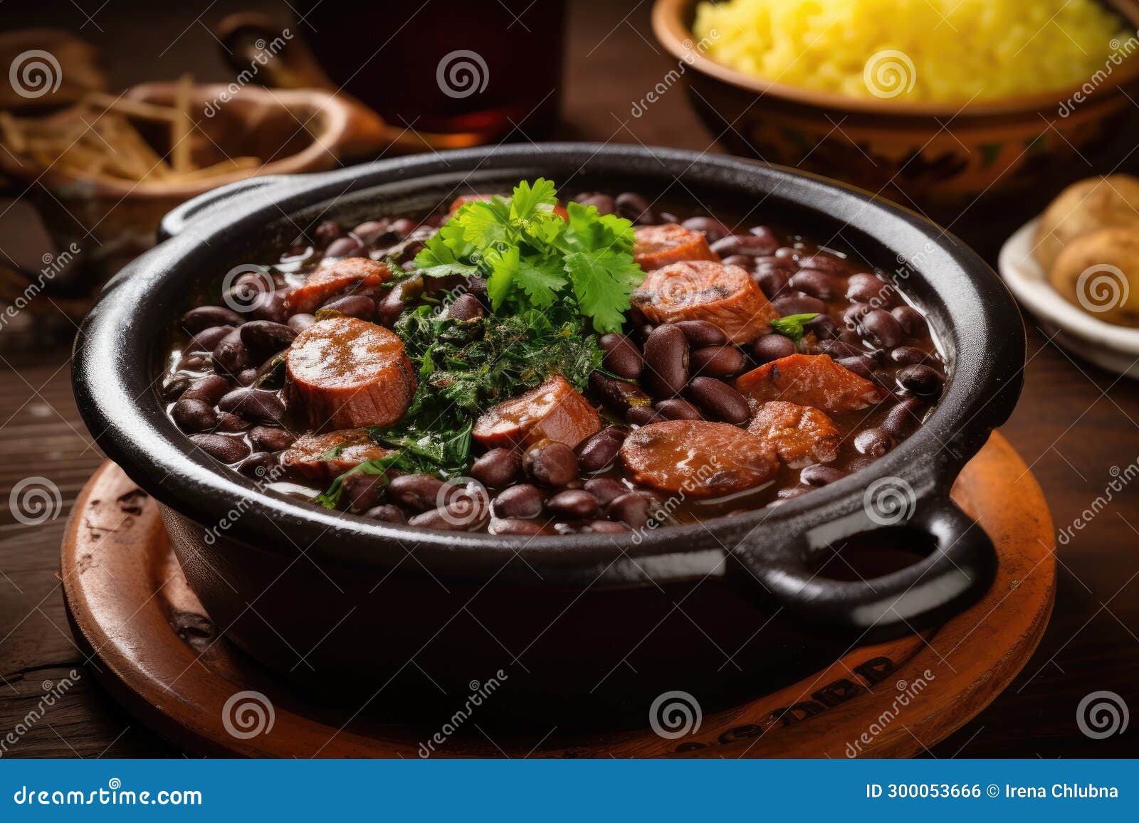 Feijoada Served in a Clay Bowl on a Rustic Wooden Table. Brazilian ...