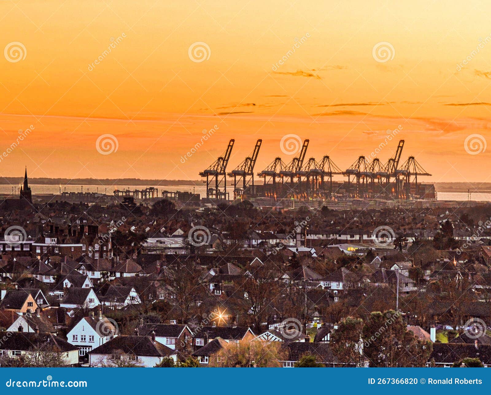 Felixstowe town at Sunset stock photo. Image of crane - 267366820