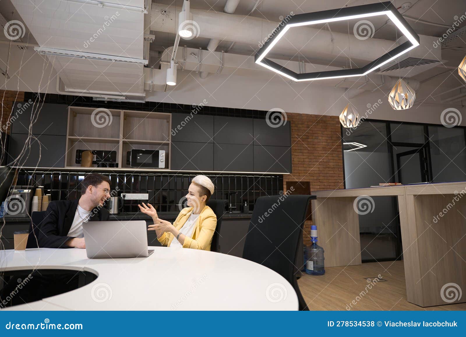 Fellow Workers Chatting during Break in Office Stock Photo - Image of ...