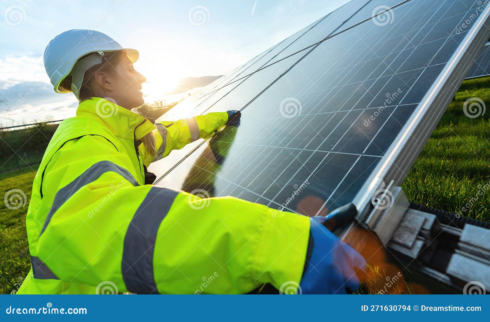 Femal Engineer with Protective Helmet Installing Solar Photovoltaic ...