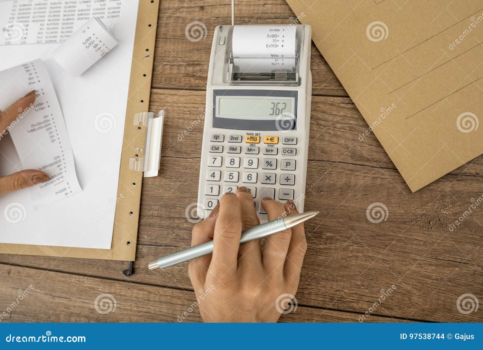 Female Accountant Using Adding Machine Stock Photo - Image of bill ...