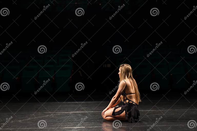 Female Actress Alone on Stage Stock Image - Image of actress, kneeling ...