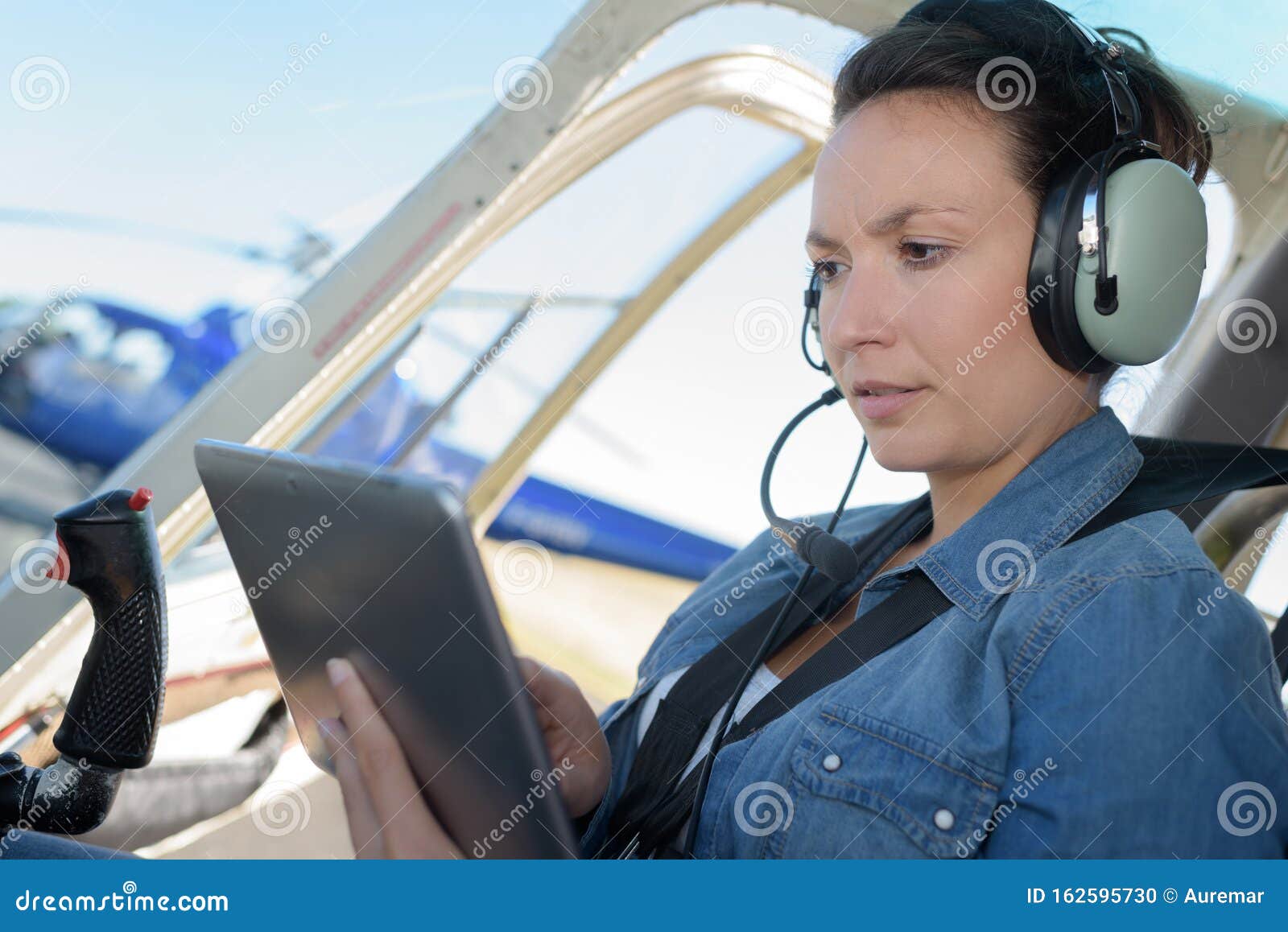 Female Aero Engineer Working on Helicopter in Hangar Stock Photo ...