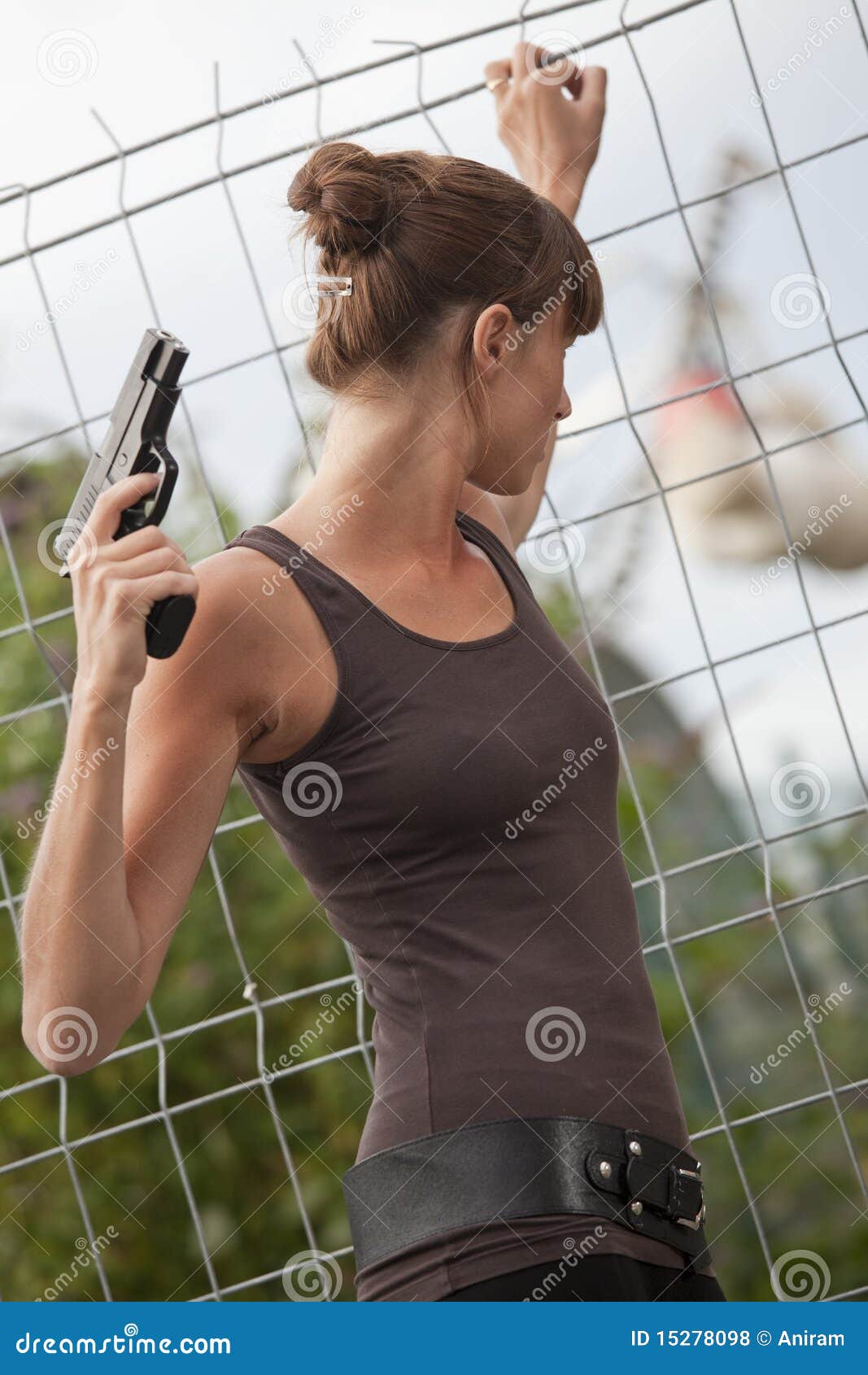 Female agent with gun stock photo. Image of danger, killer - 15278098