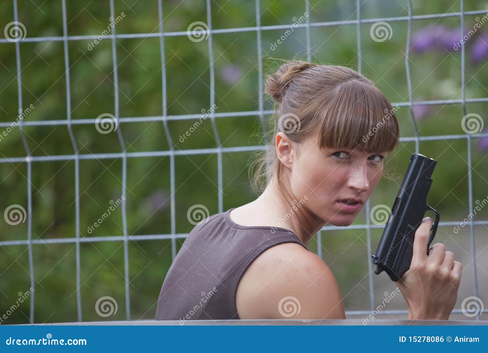 Female Agent with Gun Hiding Stock Photo - Image of aggression, hiding ...