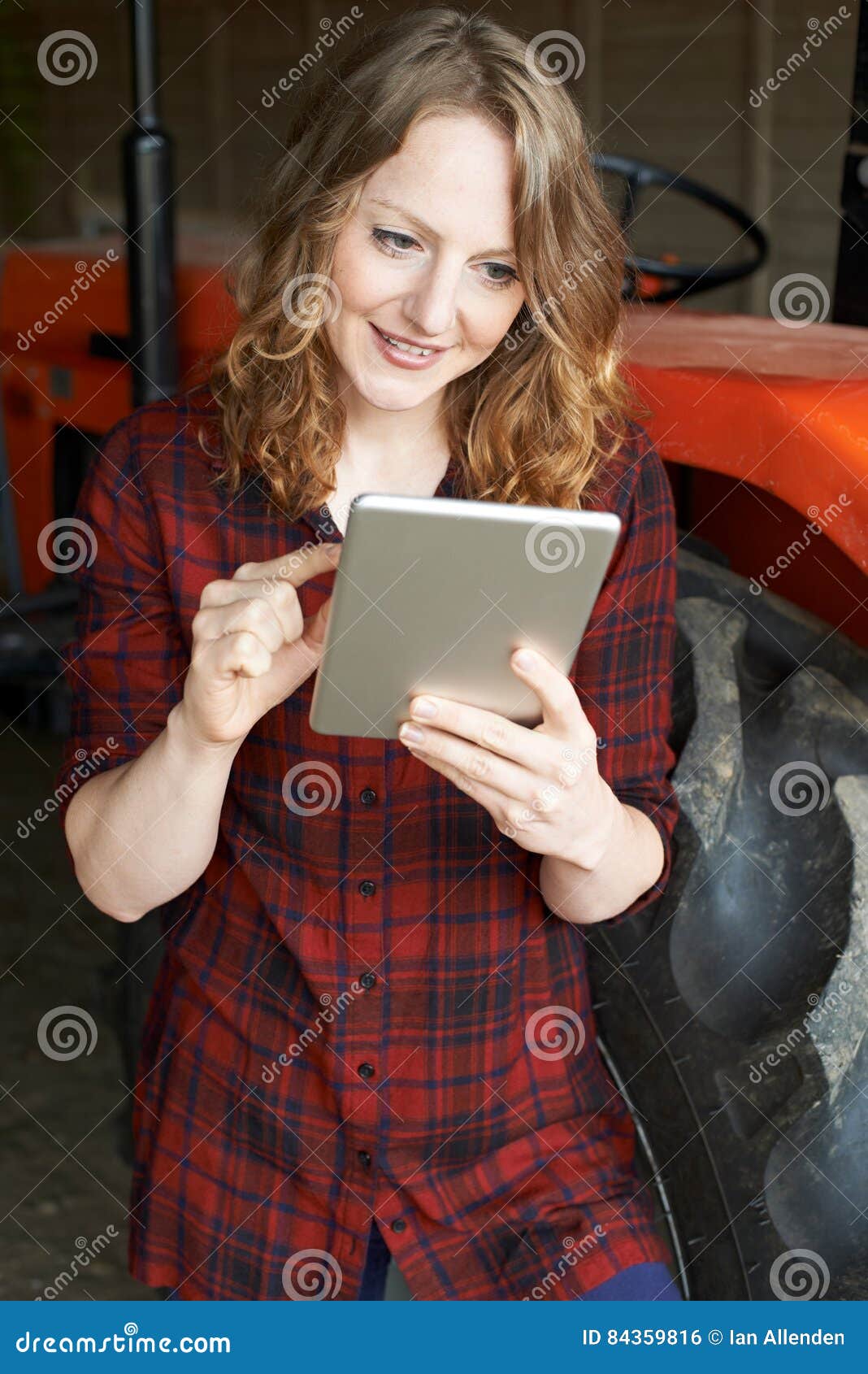 Female Agricultural Worker on Farm Using Digital Tablet Stock Photo ...