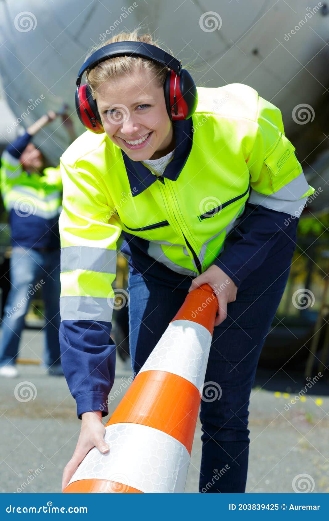 Female Airport Ground Worker Smiling Stock Image - Image of staff ...
