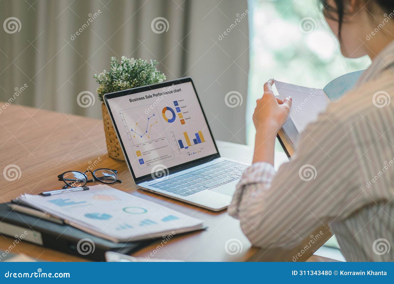 A Female Analyst Analyzes KPI Business Analytics Data Dashboard ...