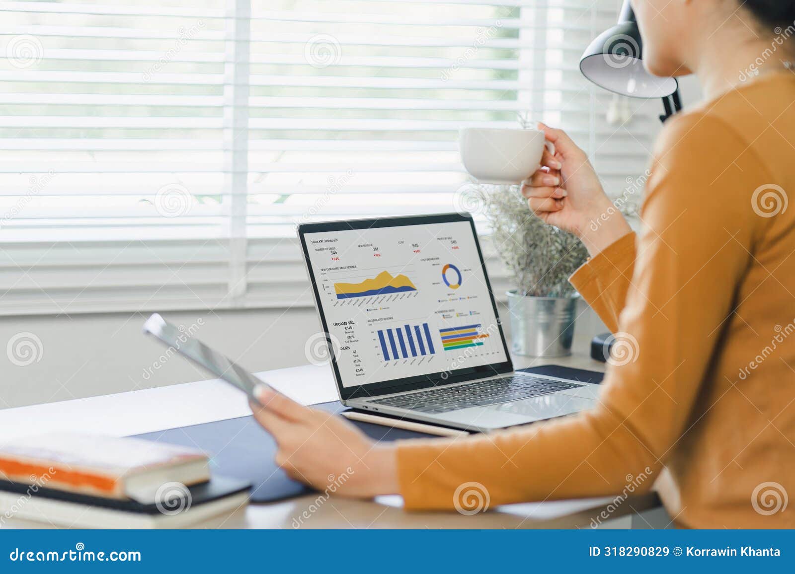 Female Analyst Analyzes KPI Business Analytics Data Dashboard ... Female Analyst Analyzes KPI Business Analytics Data Dashboard ...