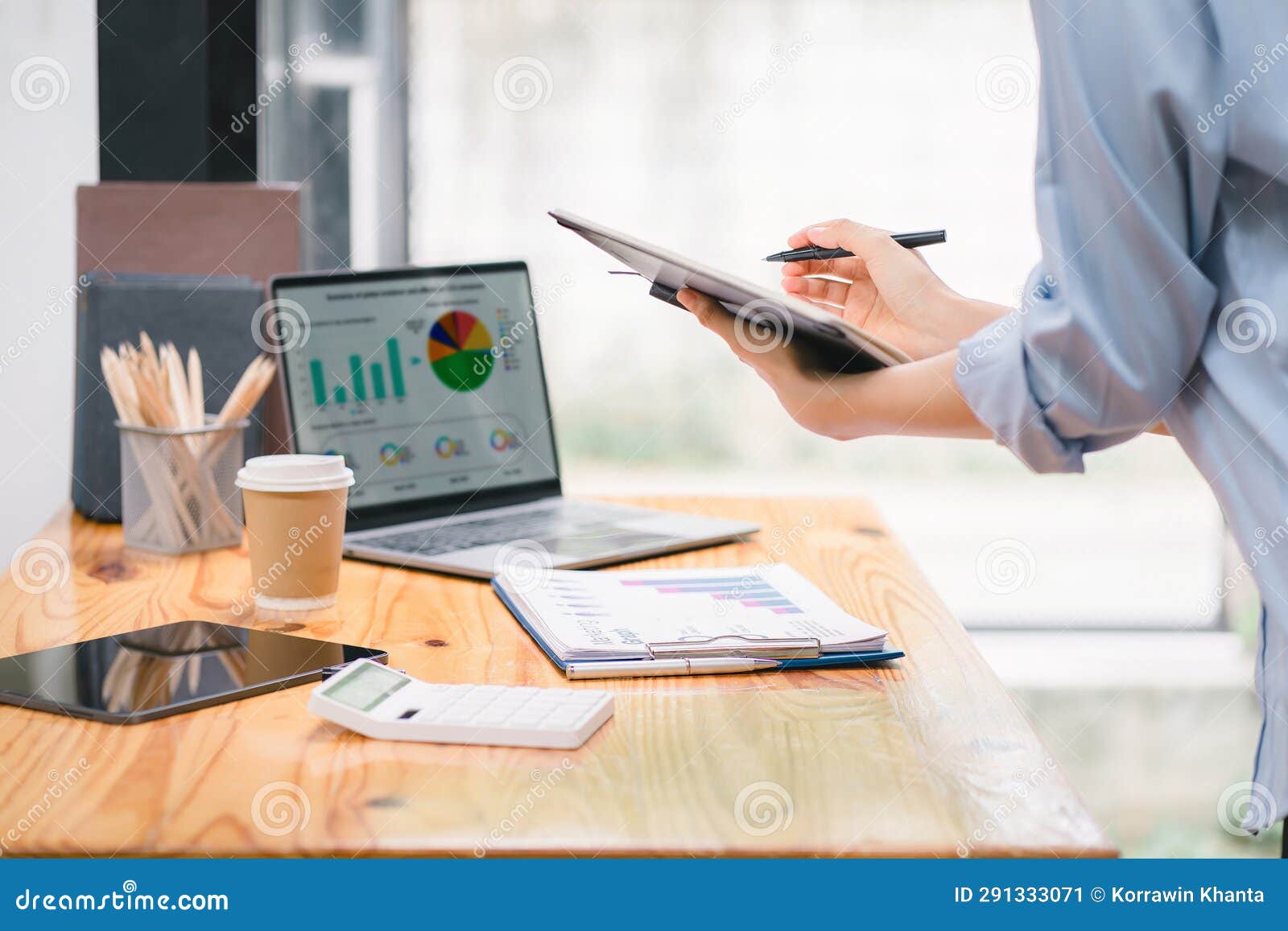 The Female Analyst Utilizes a Computer and a Dashboard for Business ...