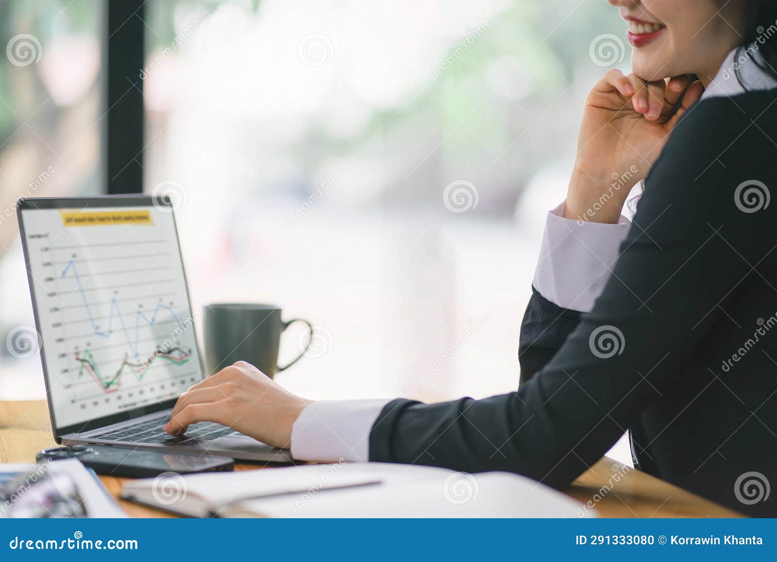 The Female Analyst Utilizes a Computer and a Dashboard for Business ...