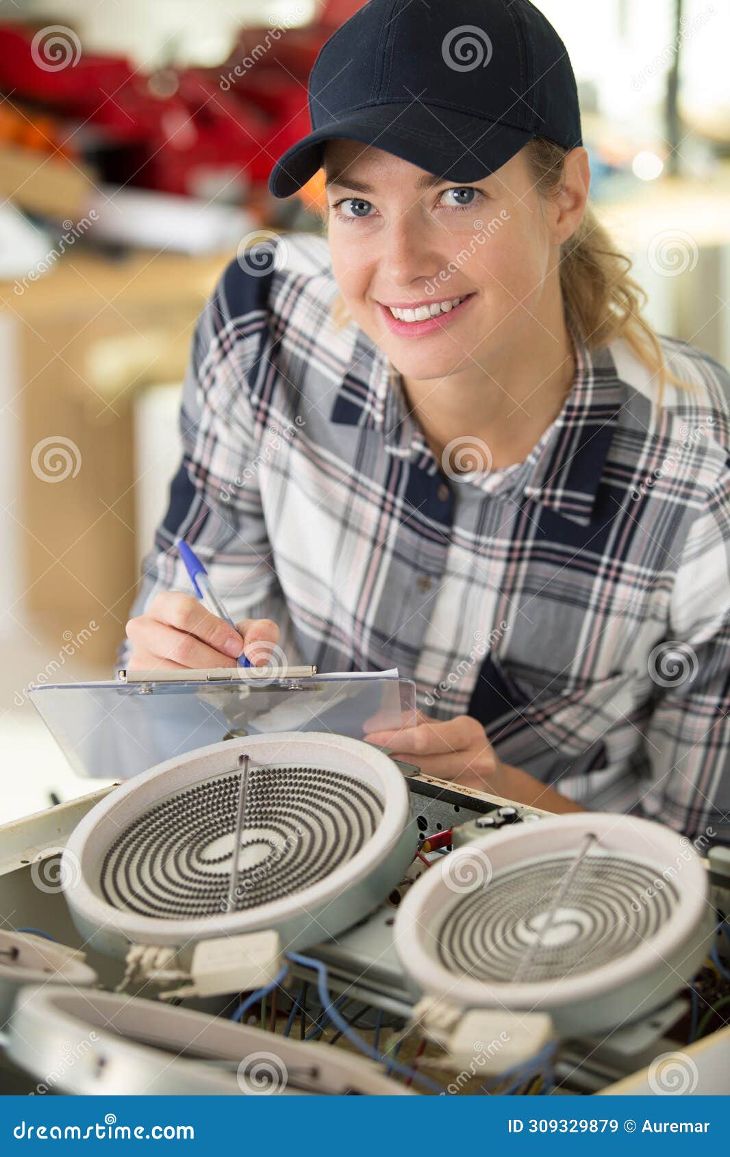 Female Apprentice Engineer Working on Machine Stock Image - Image of ...