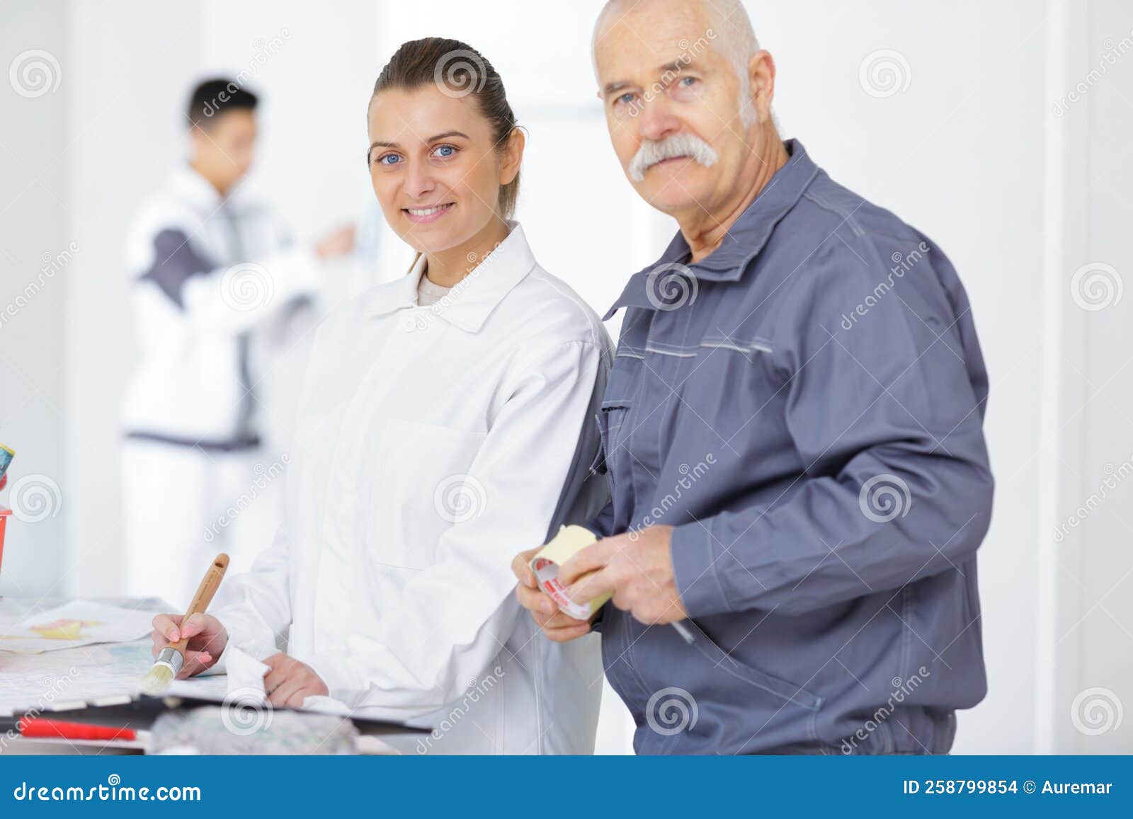 Female Apprentice and Mentor Looking at Camera Stock Photo - Image of ...
