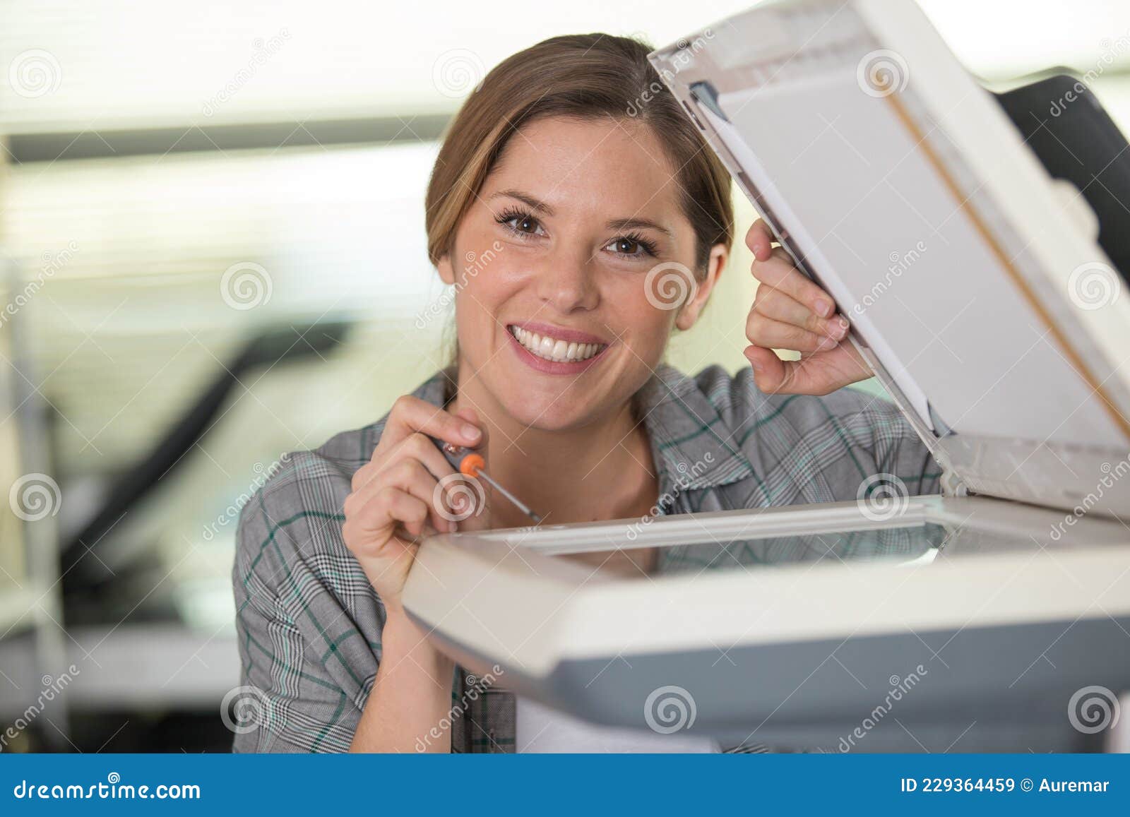 Female Apprentice Smiling at Camera Stock Image - Image of internet ...