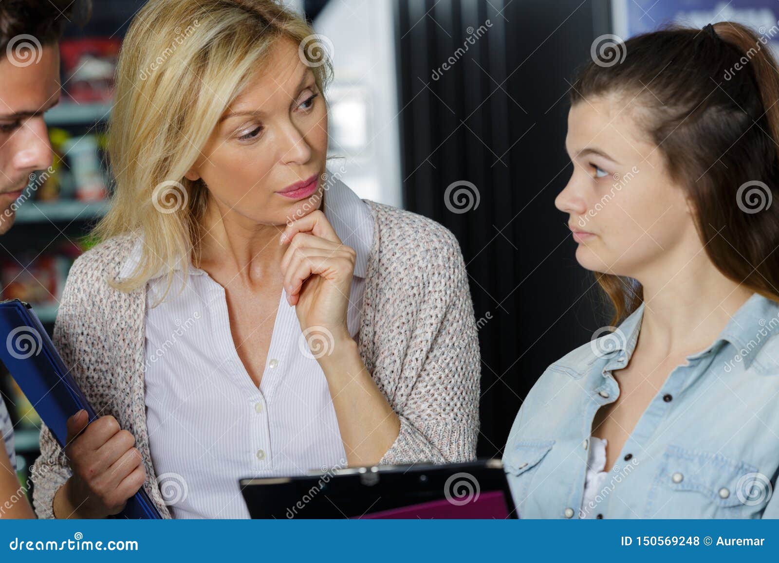 Female Apprentice Talking with Supervisor Stock Photo - Image of ...