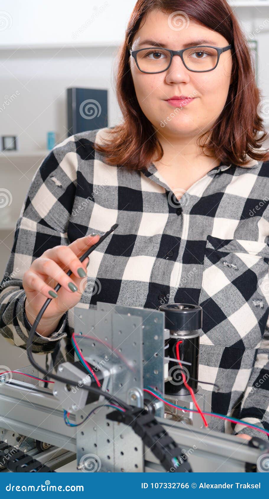 Female Apprentice Working on CNC Machinery. Stock Photo - Image of ...