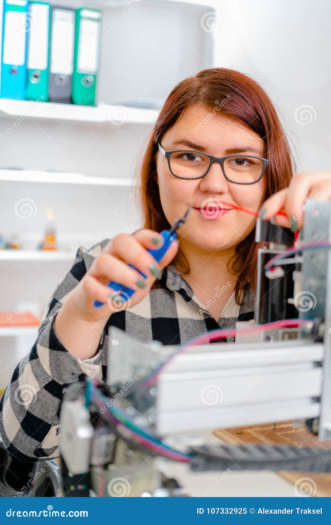 Female Apprentice Working on CNC Machinery. Stock Image - Image of ...