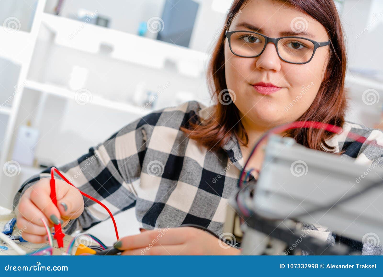 Female Apprentice Working on CNC Machinery. Stock Photo - Image of ...