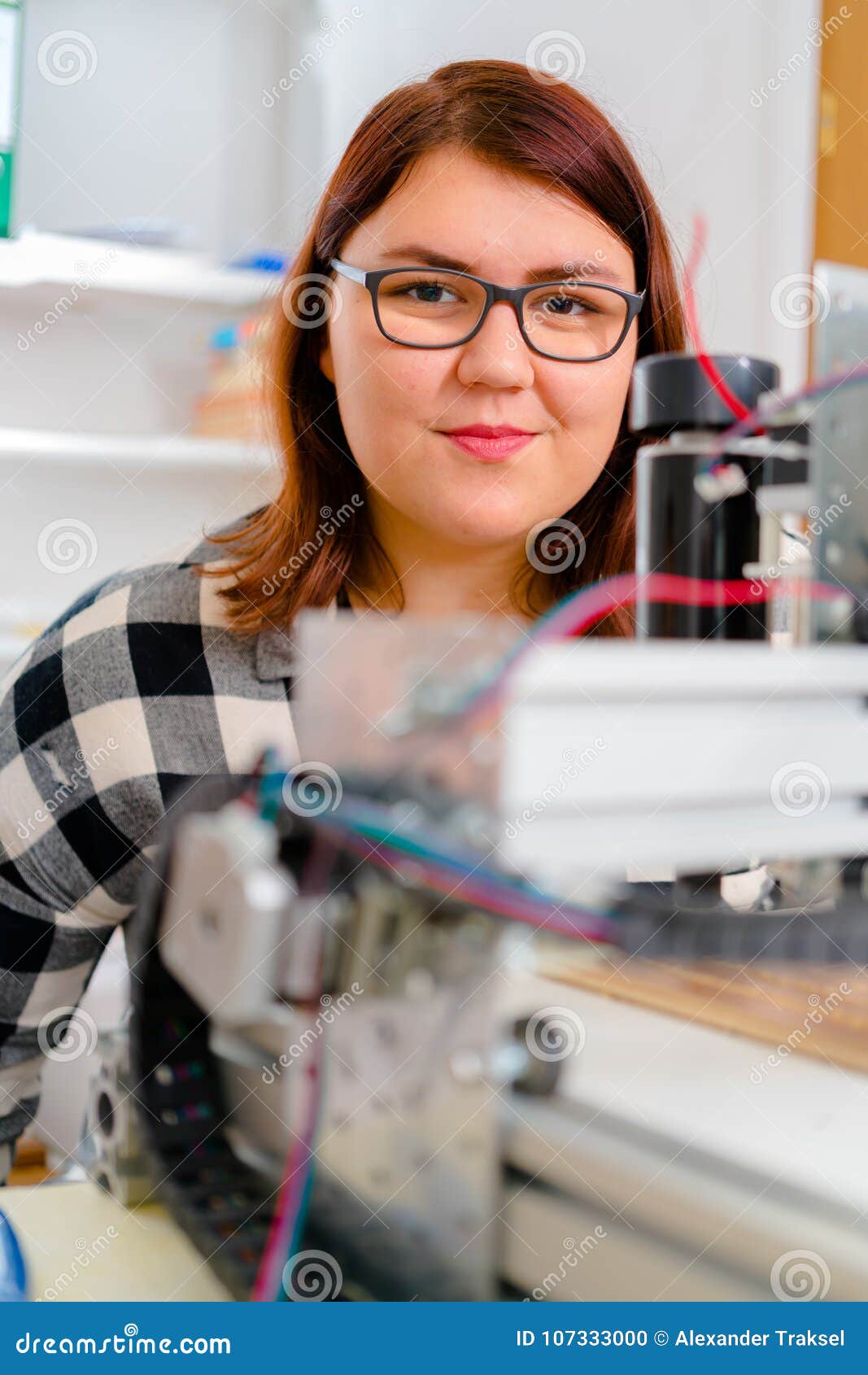 Female Apprentice Working on CNC Machinery. Stock Photo - Image of ...