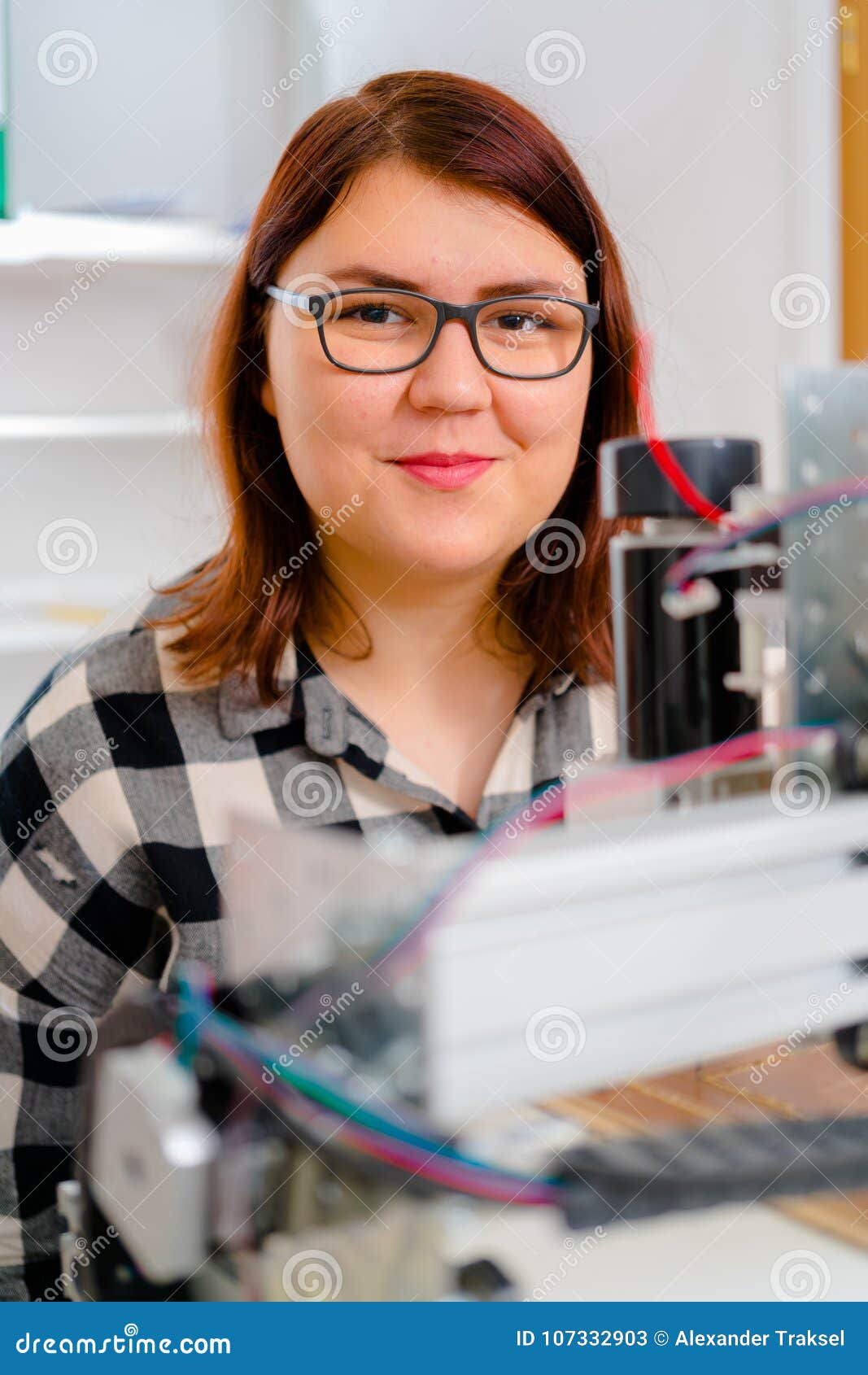 Female Apprentice Working on CNC Machinery. Stock Image - Image of ...