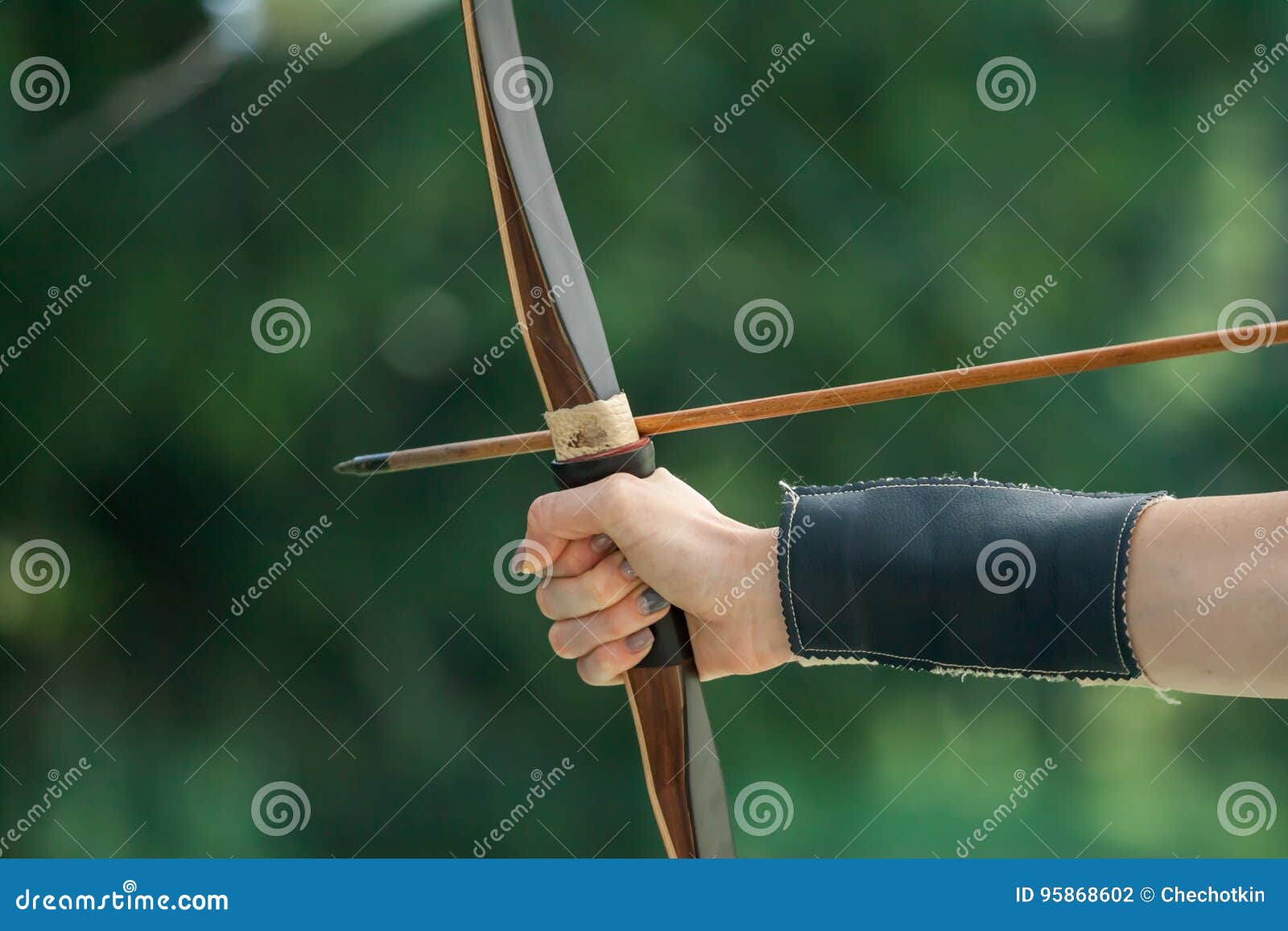Female Archer Hand Keeping Bow Stock Photo - Image of aiming, accuracy ...