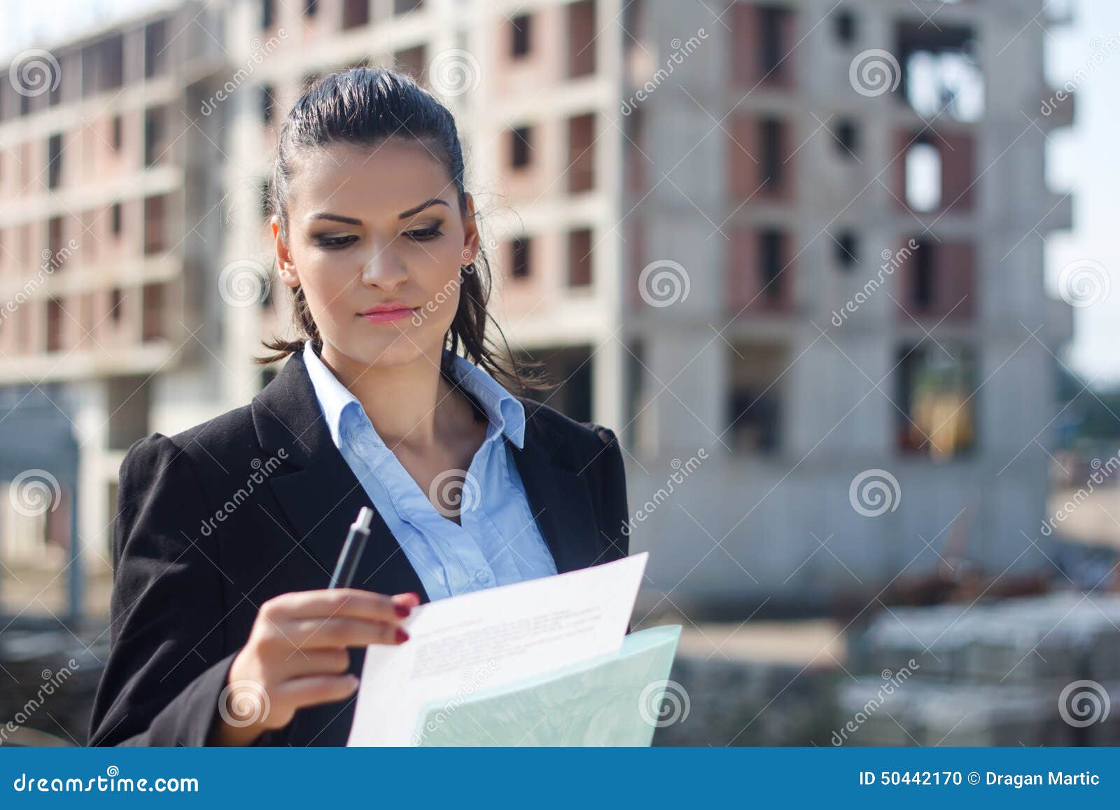Female Architect at a Construction Site Stock Photo - Image of plan ...