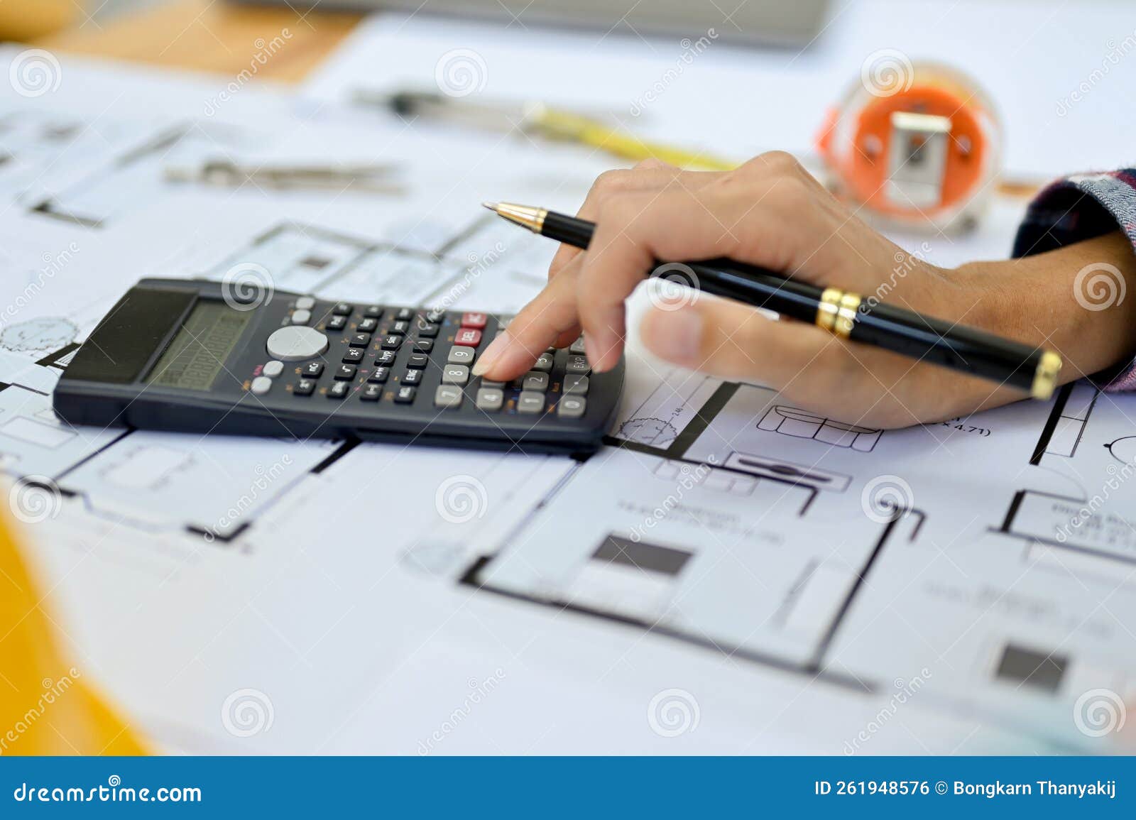 Female Architect or Engineer Using Calculator, Checking the Final ...
