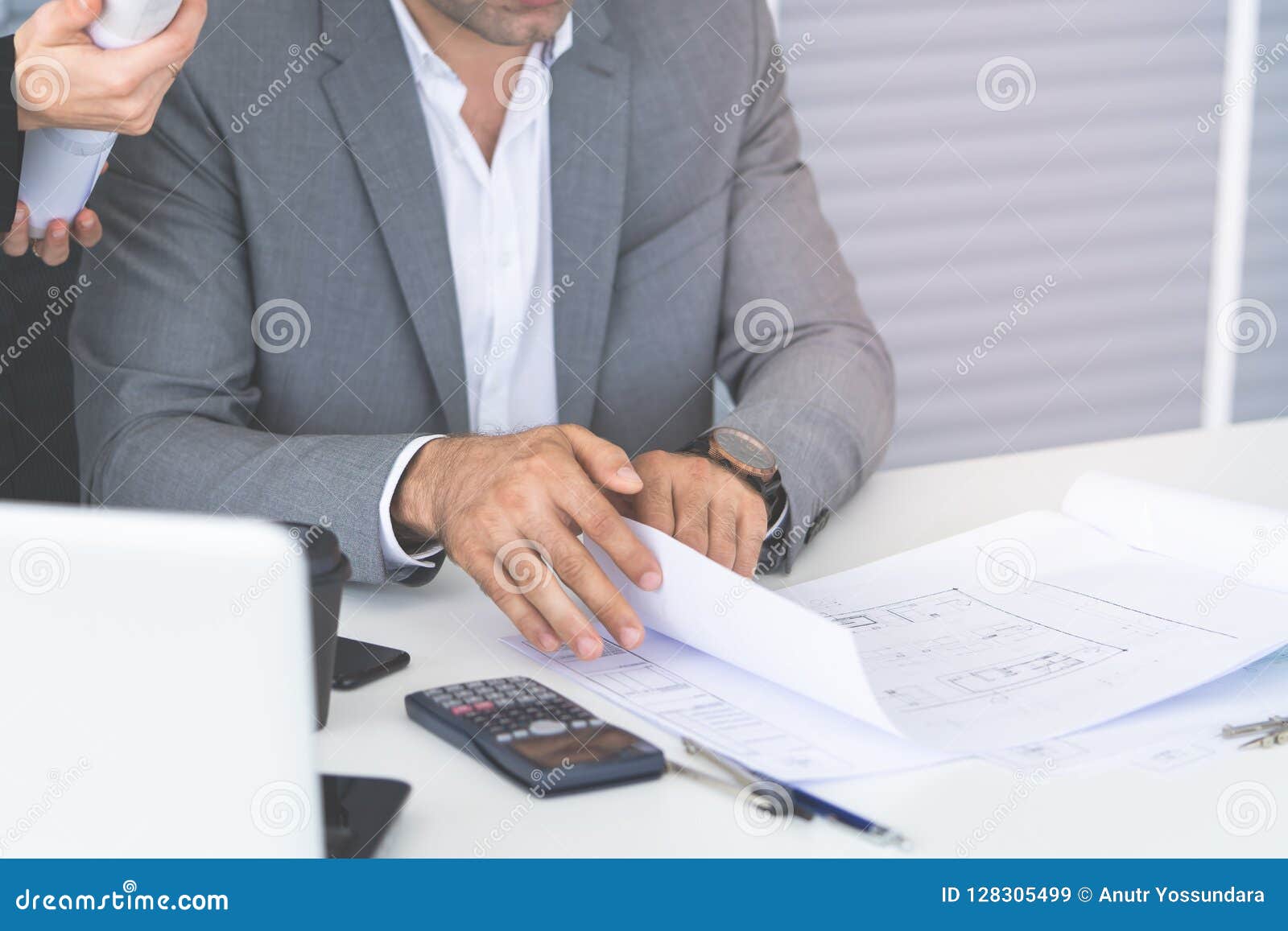 Female Architect Showing Her Boss the Real Estate Building Pl Stock ...