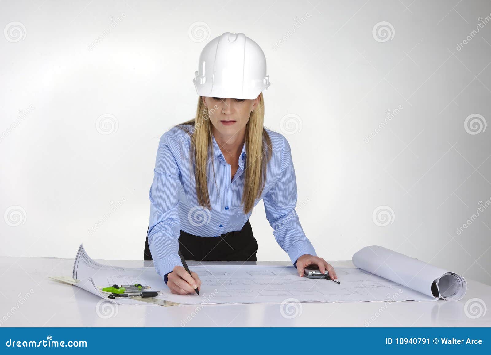 Female Architect Working on Blue Prints Stock Image - Image of ...