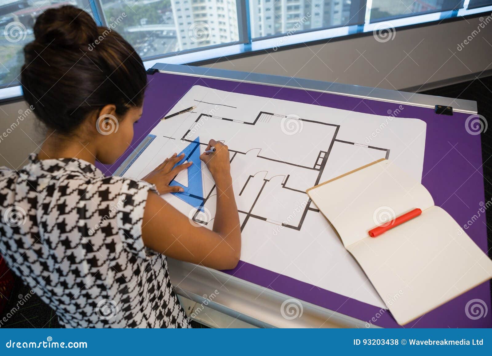 Female Architect Working on Blueprint Stock Photo - Image of board ...