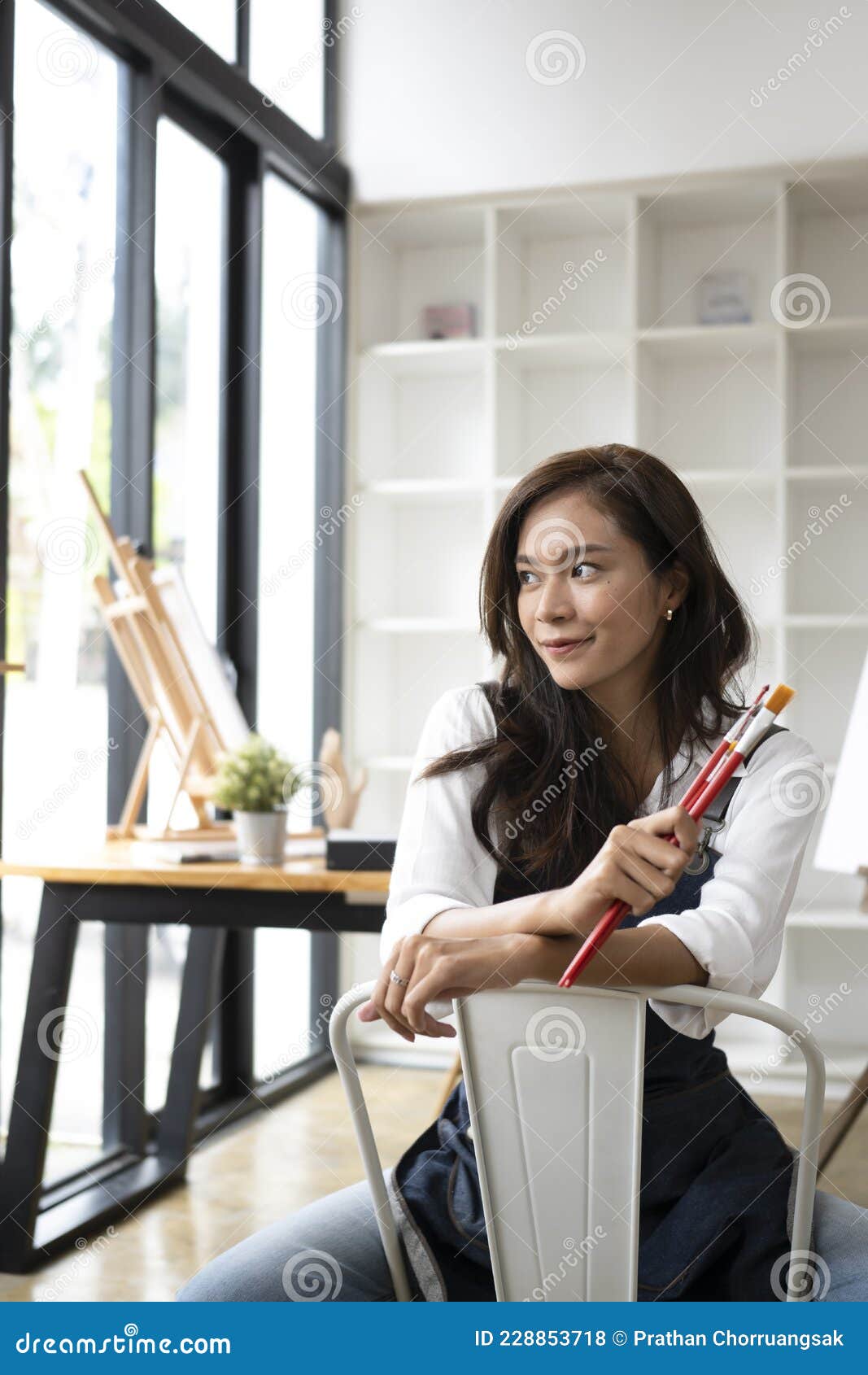 Female Artist Sitting in the Art Studio. Stock Photo - Image of ...