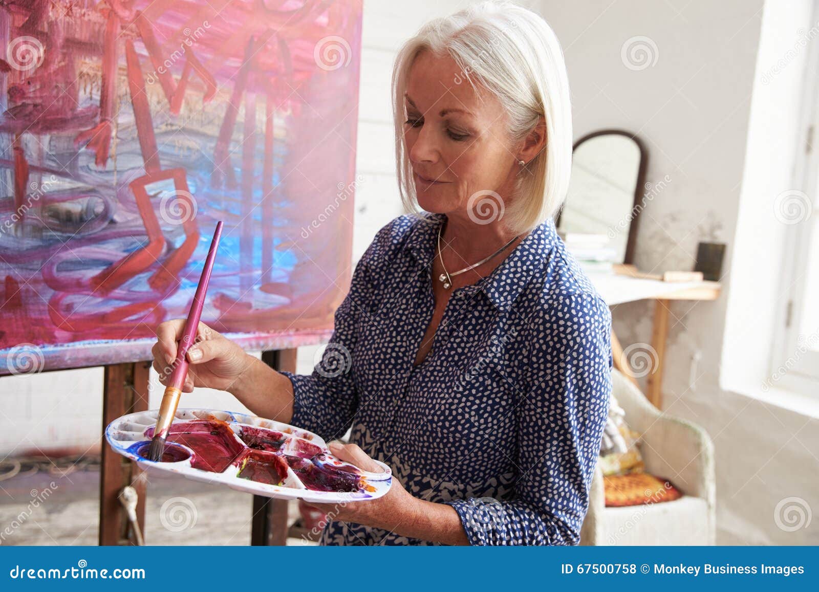 Female Artist Working on Painting in Studio Stock Photo - Image of ...