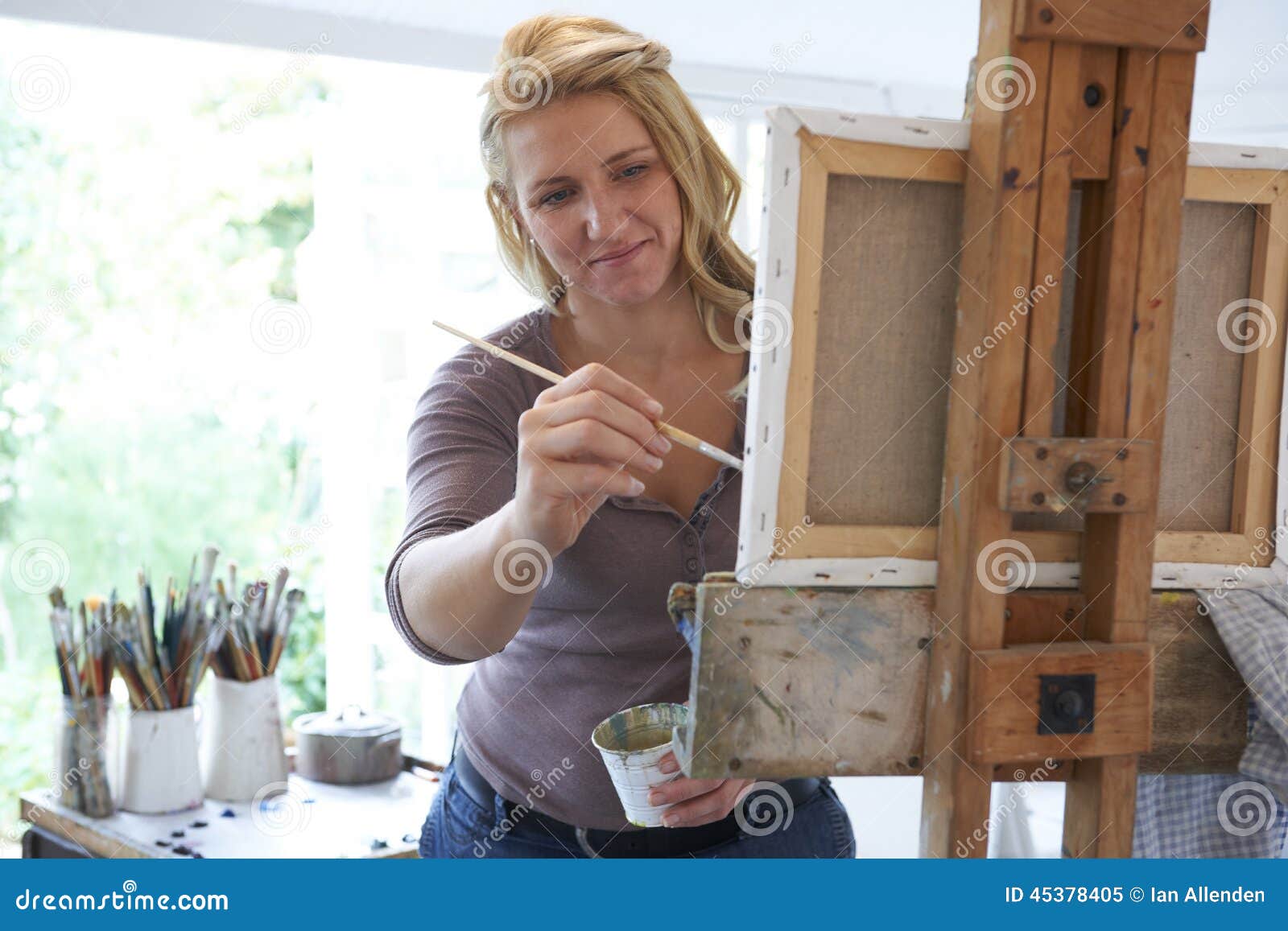 Female Artist Working in Studio Stock Image - Image of indoors ...