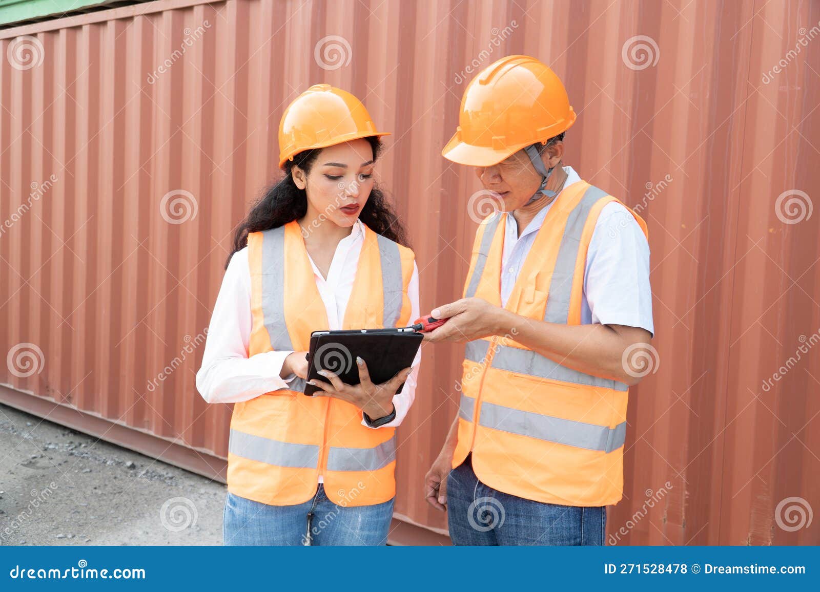 Female Asian Engineer and Foreman Engineer Loading Containers from ...