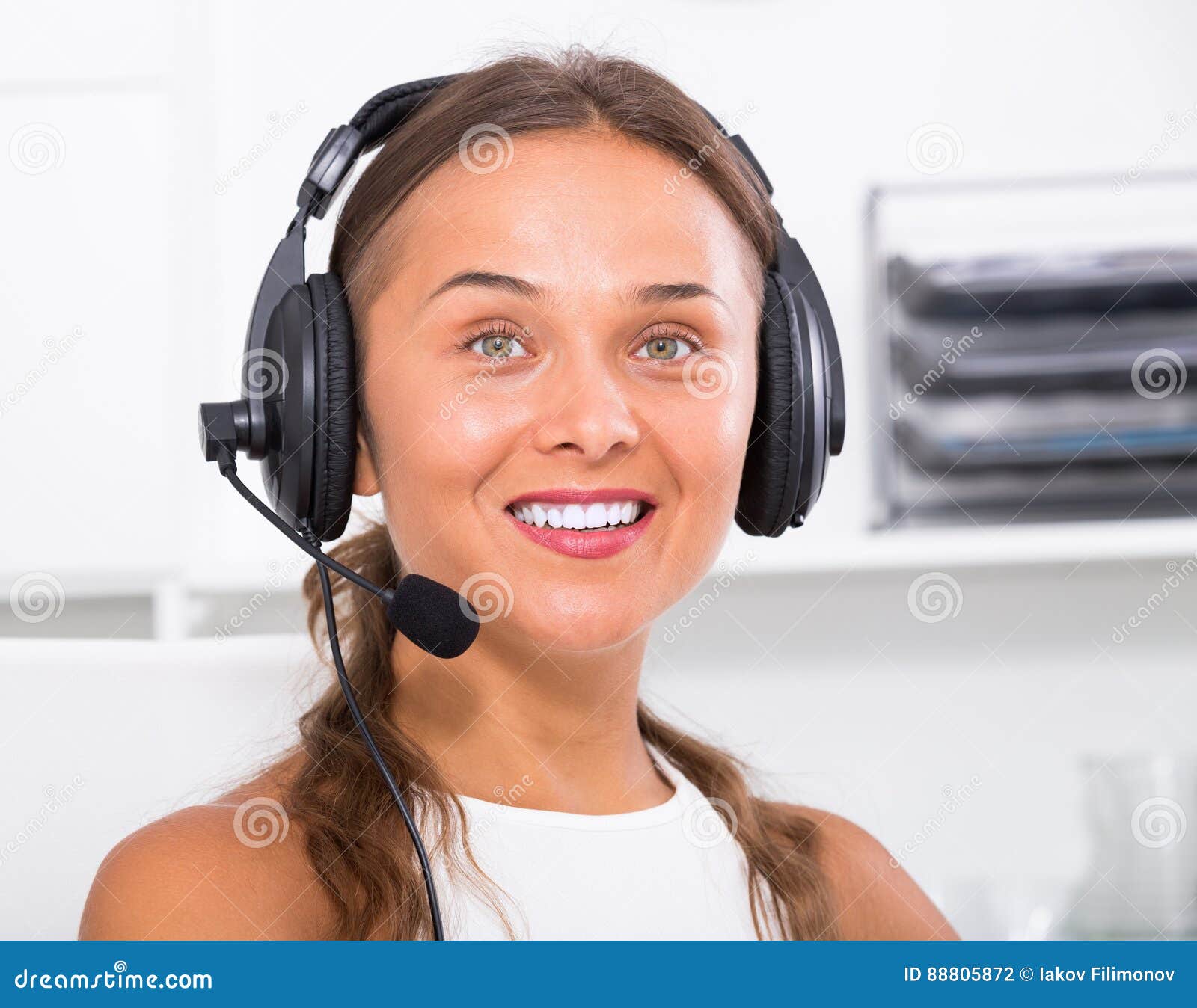 Female Assistance Talking with Customer Using Hands-free Stock Photo ...