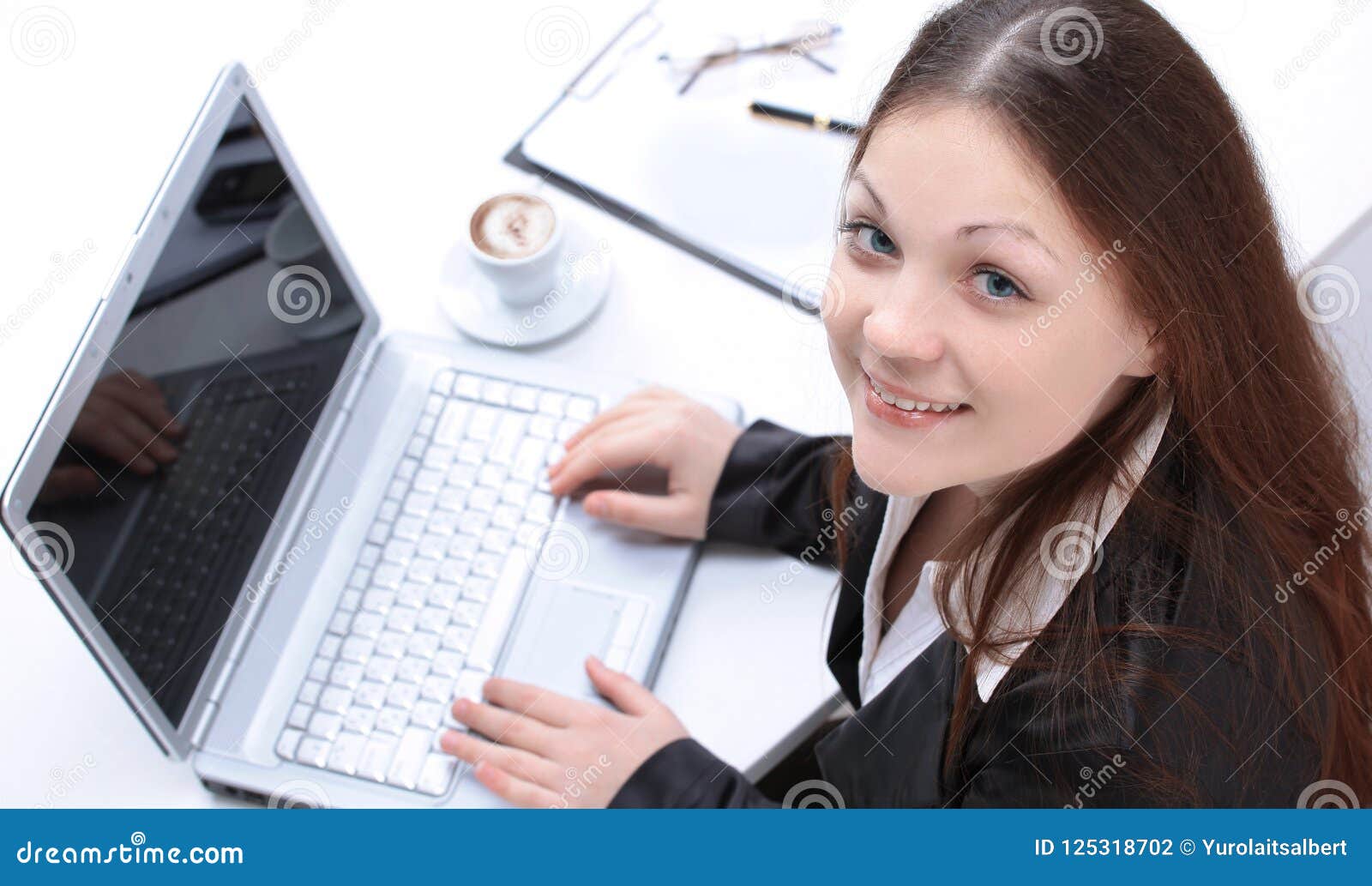 .female Assistant Sitting at Her Desk and Looking at Camera Stock Photo ...