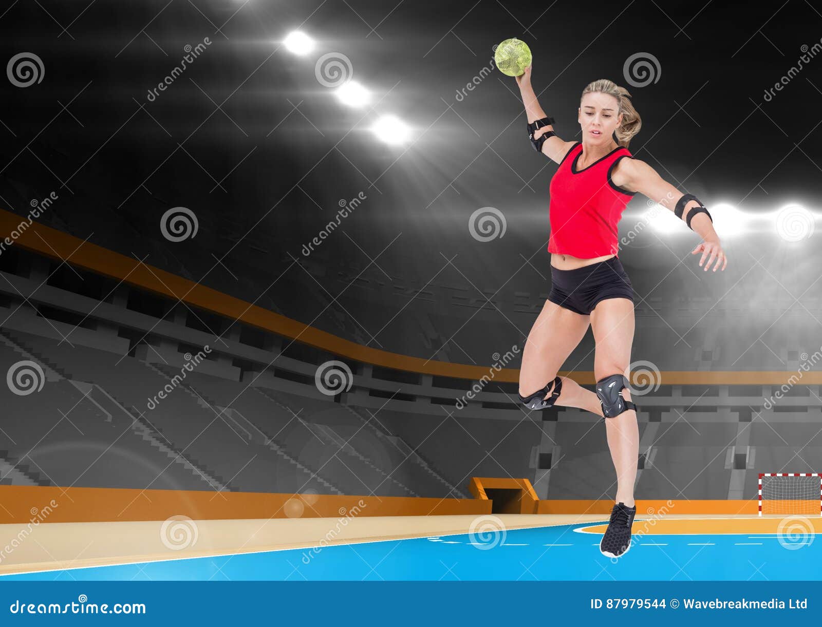 Female Athlete Playing Handball in Stadium Stock Photo - Image of ...