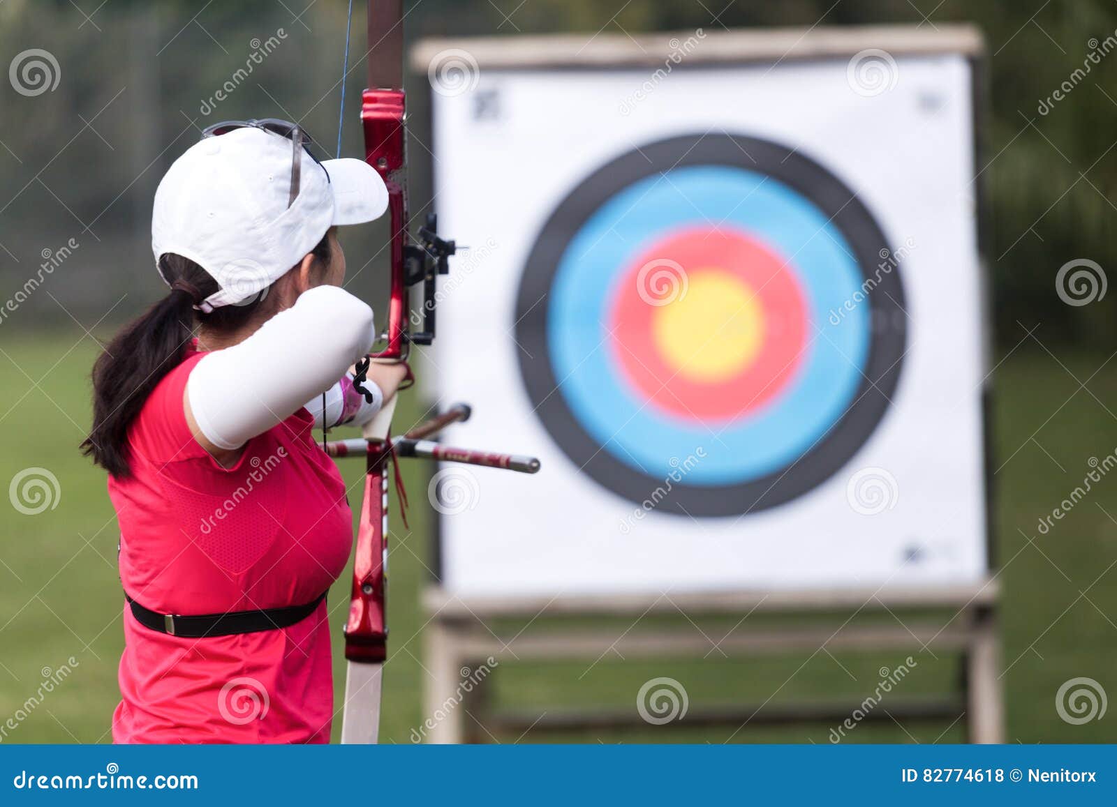 Female Athlete Practicing Archery in Stadium Stock Photo - Image of ...