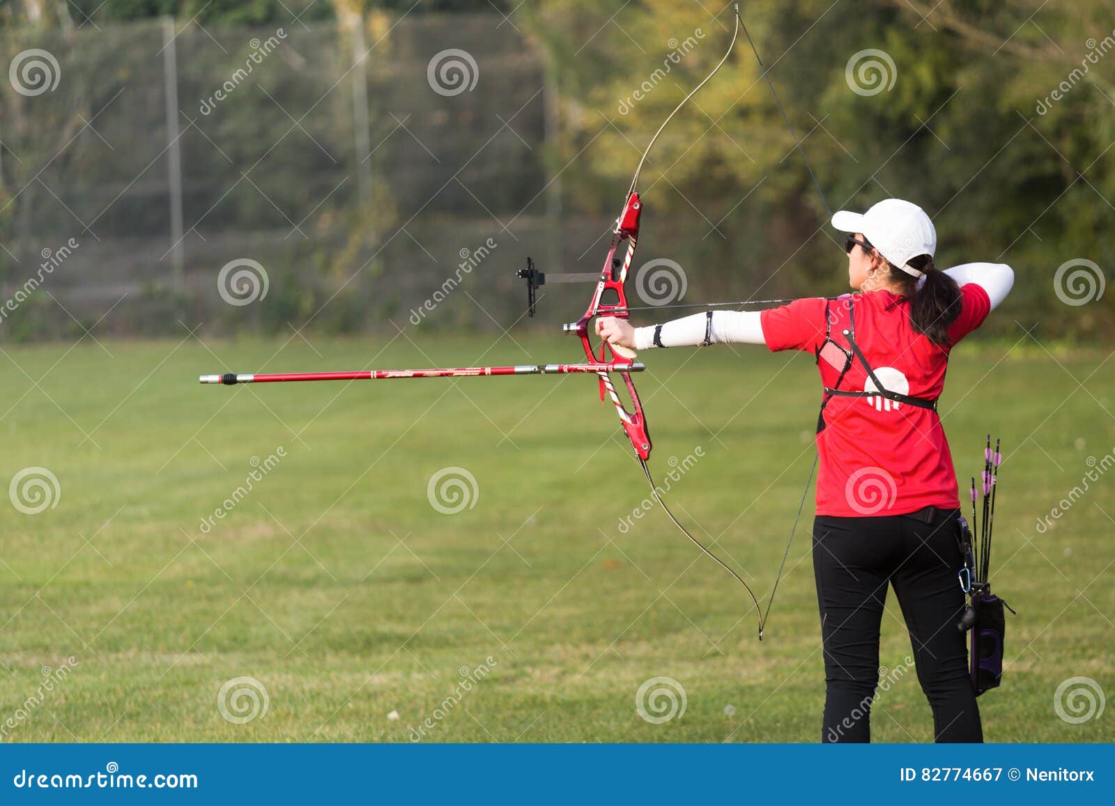 Female Athlete Practicing Archery in Stadium Stock Image - Image of ...